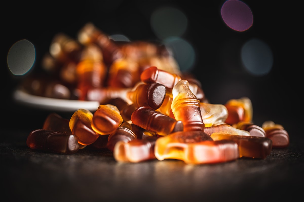Les bonbons en forme de bouteille de Coca-Cola à partager